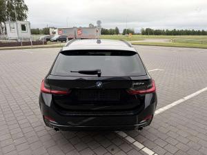 Black BMW 320 2022 in Marijampole, with an engine capacity of 2.00 L and mileage of 123 thousand km for 21900 €, photo 11 on AUTOMOTO.COM.LV