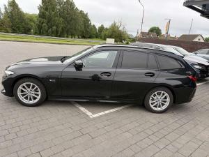 Black BMW 320 2022 in Marijampole, with an engine capacity of 2.00 L and mileage of 123 thousand km for 21900 €, photo 13 on AUTOMOTO.COM.LV