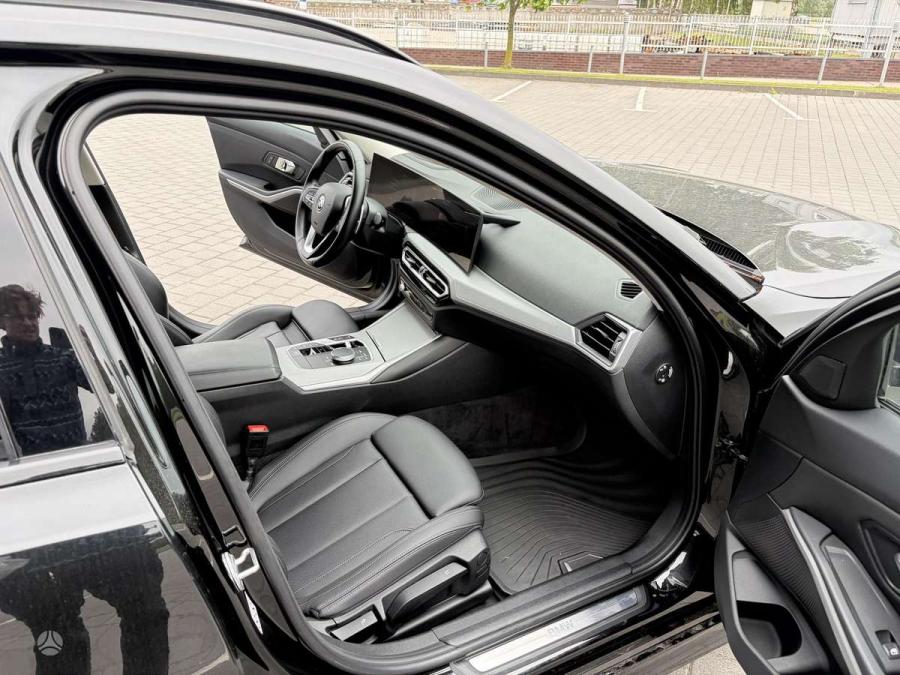 Black BMW 320 2022 in Marijampole, with an engine capacity of 2.00 L and mileage of 123 thousand km for 21900 €, photo 26 on AUTOMOTO.COM.LV