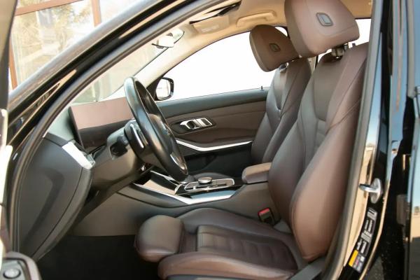 Black BMW 320 2022 in Tukums, with an engine capacity of 2.00 L and mileage of 178 thousand km for 21990 €, photo 6 on AUTOMOTO.COM.LV