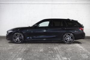Black BMW 320 2023 in Vilnius, with an engine capacity of 2.00 L and mileage of 88 thousand km for 36441 €, photo 4 on AUTOMOTO.COM.LV