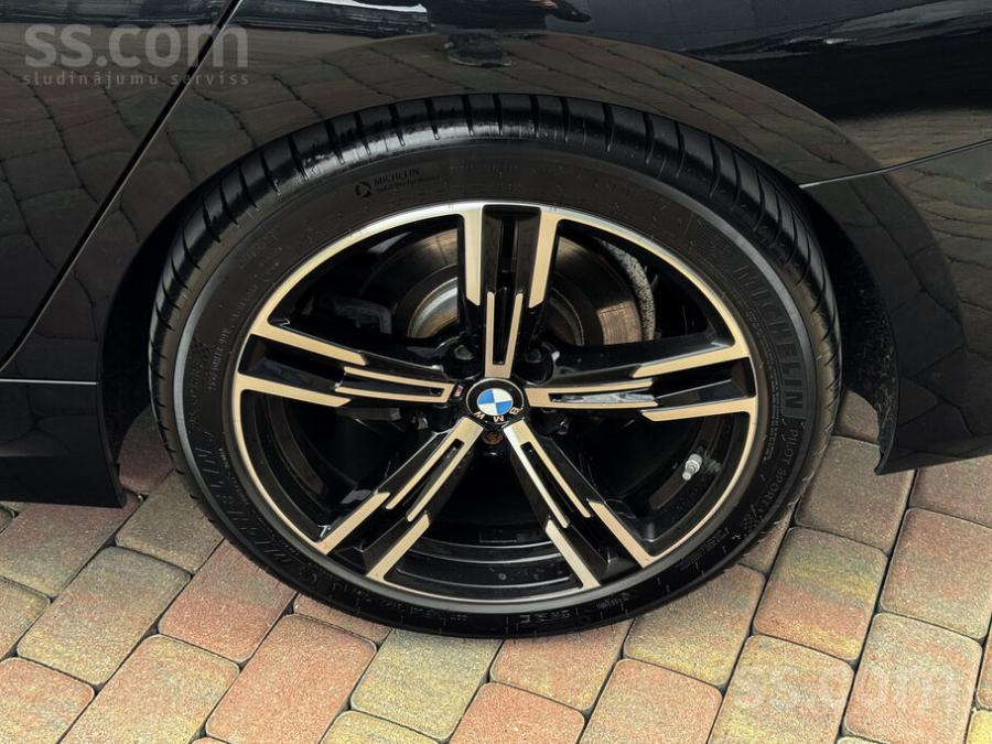 Black BMW 320 2023 in Riga, with an engine capacity of 2.00 L and mileage of 149 thousand km for 27300 €, photo 9 on AUTOMOTO.COM.LV