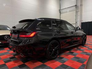 Black BMW 320 2023 in Vilnius, with an engine capacity of 2.00 L and mileage of 130 thousand km for 32499 €, photo 5 on AUTOMOTO.COM.LV