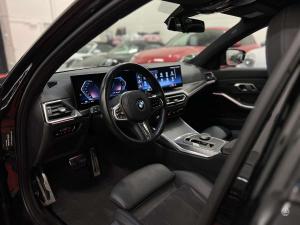Black BMW 320 2023 in Vilnius, with an engine capacity of 2.00 L and mileage of 130 thousand km for 32499 €, photo 14 on AUTOMOTO.COM.LV