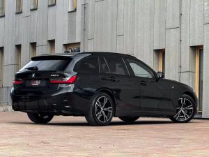 Black BMW 320 2023 in Riga, with an engine capacity of 2.00 L and mileage of 149 thousand km for 27300 €, photo 5 on AUTOMOTO.COM.LV