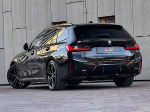 Black BMW 320 2023 in Riga, with an engine capacity of 2.00 L and mileage of 155 thousand km for 25500 €, photo 3 on AUTOMOTO.COM.LV