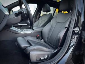 Black BMW 320 2023 in Riga, with an engine capacity of 2.00 L and mileage of 155 thousand km for 25500 €, photo 14 on AUTOMOTO.COM.LV