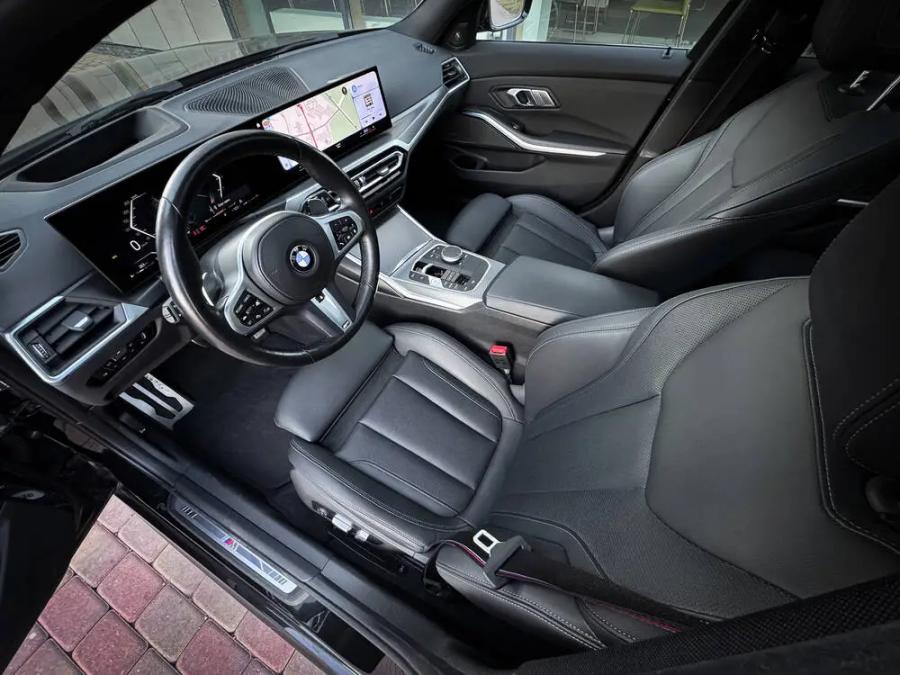 Black BMW 320 2023 in Riga, with an engine capacity of 2.00 L and mileage of 155 thousand km for 25500 €, photo 16 on AUTOMOTO.COM.LV