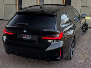 Black BMW 320 2023 in Riga, with an engine capacity of 2.00 L and mileage of 155 thousand km for 25500 €, photo 34 on AUTOMOTO.COM.LV
