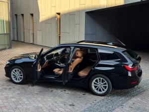 Black BMW 320 2023 in Riga, with an engine capacity of 2.00 L and mileage of 152 thousand km for 26500 €, photo 5 on AUTOMOTO.COM.LV