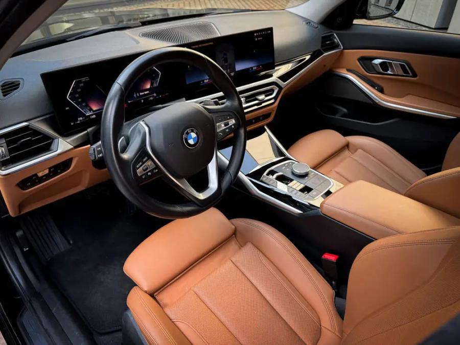 Black BMW 320 2023 in Riga, with an engine capacity of 2.00 L and mileage of 152 thousand km for 26500 €, photo 12 on AUTOMOTO.COM.LV