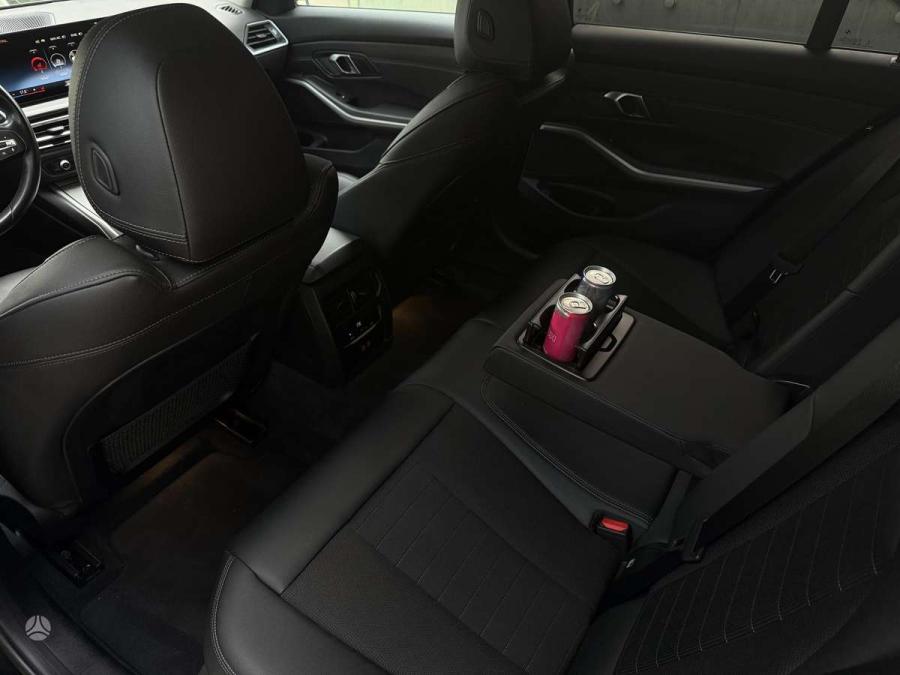 Black BMW 320 2023 in Vilnius, with an engine capacity of 2.00 L and mileage of 109 thousand km for 21999 €, photo 20 on AUTOMOTO.COM.LV
