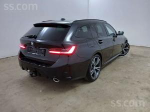 Black BMW 320 2023 in Tukums, with an engine capacity of 2.00 L and mileage of 167 thousand km for 32990 €, photo 5 on AUTOMOTO.COM.LV