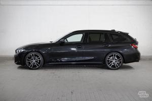 Black BMW 320 2023 in Vilnius, with an engine capacity of 2.00 L and mileage of 88 thousand km for 32988 €, photo 5 on AUTOMOTO.COM.LV