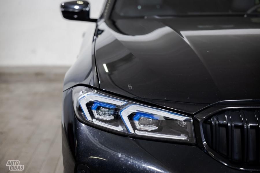 Black BMW 320 2023 in Vilnius, with an engine capacity of 2.00 L and mileage of 88 thousand km for 32988 €, photo 7 on AUTOMOTO.COM.LV