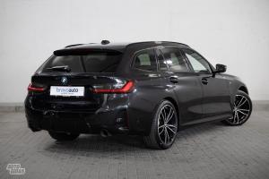 Black BMW 320 2023 in Vilnius, with an engine capacity of 2.00 L and mileage of 88 thousand km for 32988 €, photo 11 on AUTOMOTO.COM.LV