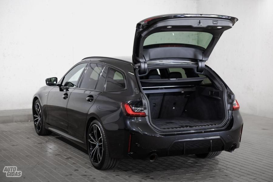 Black BMW 320 2023 in Vilnius, with an engine capacity of 2.00 L and mileage of 88 thousand km for 32988 €, photo 13 on AUTOMOTO.COM.LV