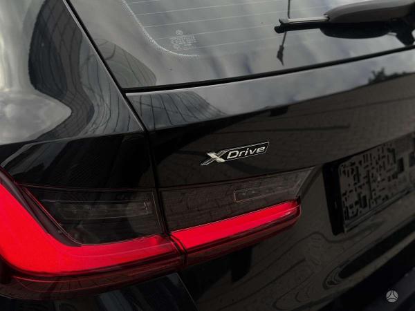 Black BMW 320 2023 in Vilnius, with an engine capacity of 2.00 L and mileage of 114 thousand km for 19999 €, photo 6 on AUTOMOTO.COM.LV