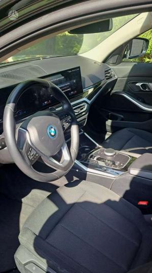 Black BMW 320 2023 in Sakiai, with an engine capacity of 2.00 L and mileage of 173 thousand km for 21999 €, photo 12 on AUTOMOTO.COM.LV