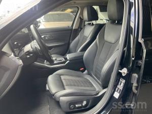 Black BMW 320 2023 in Riga, with an engine capacity of 2.00 L and mileage of 155 thousand km for 23900 €, photo 11 on AUTOMOTO.COM.LV