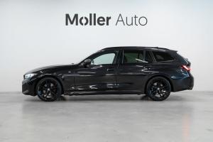 Black BMW 320 2024 in Vilnius, with an engine capacity of 2.00 L and mileage of 82 thousand km for 38400 €, photo 3 on AUTOMOTO.COM.LV