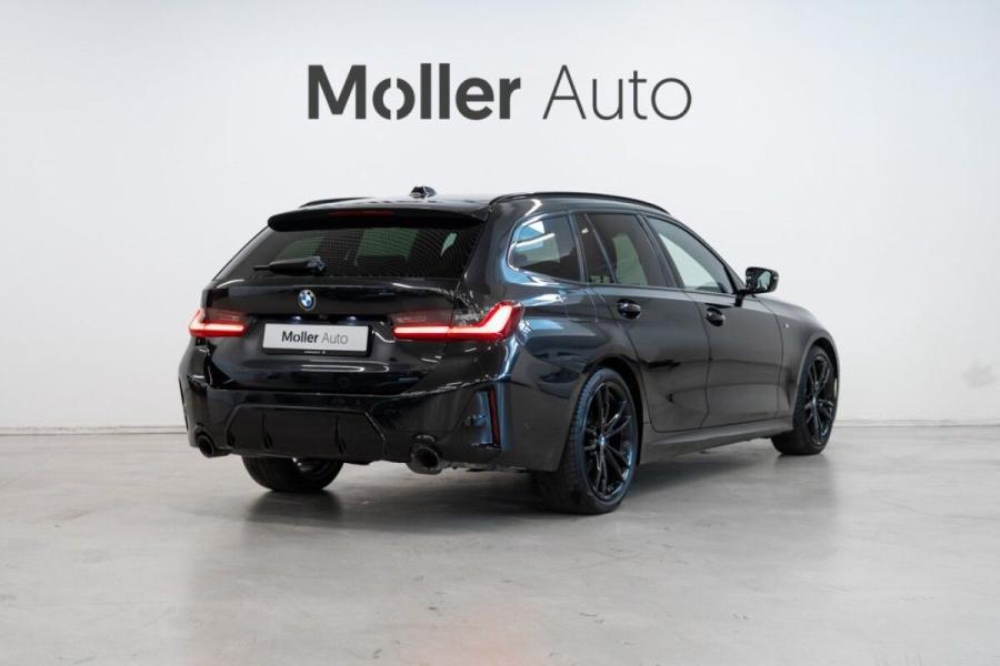 Black BMW 320 2024 in Vilnius, with an engine capacity of 2.00 L and mileage of 82 thousand km for 38400 €, photo 4 on AUTOMOTO.COM.LV