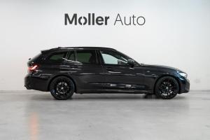 Black BMW 320 2024 in Vilnius, with an engine capacity of 2.00 L and mileage of 82 thousand km for 38400 €, photo 5 on AUTOMOTO.COM.LV
