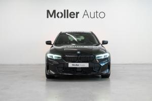 Black BMW 320 2024 in Vilnius, with an engine capacity of 2.00 L and mileage of 82 thousand km for 38400 €, photo 6 on AUTOMOTO.COM.LV
