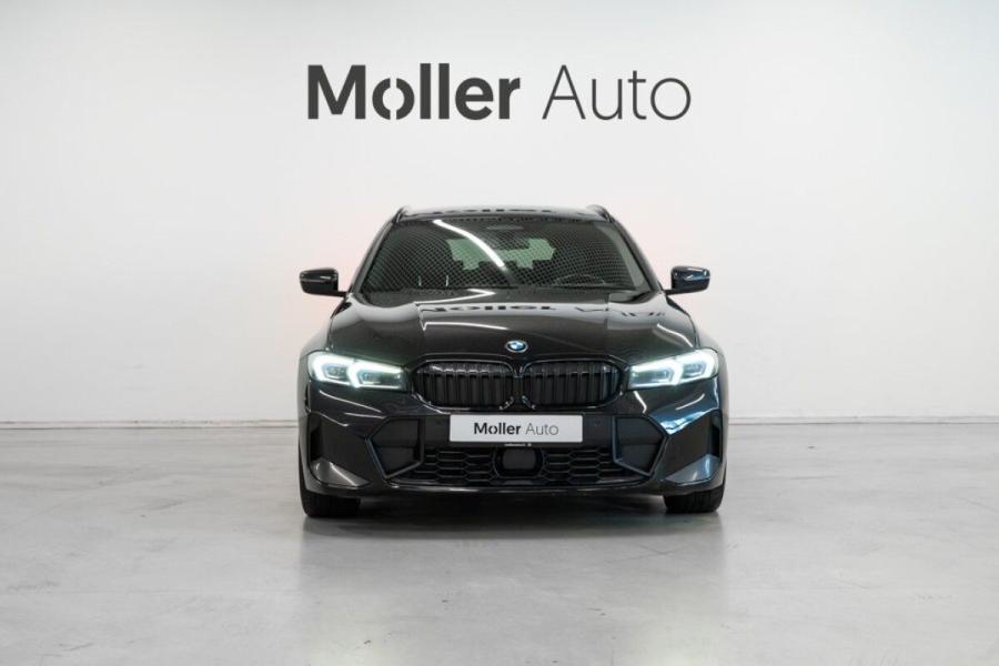 Black BMW 320 2024 in Vilnius, with an engine capacity of 2.00 L and mileage of 82 thousand km for 38400 €, photo 6 on AUTOMOTO.COM.LV