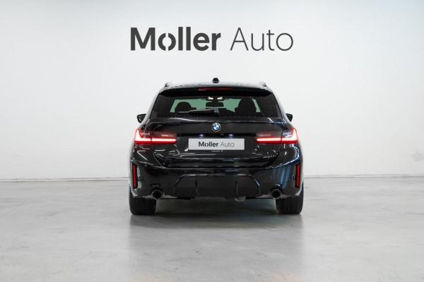 Black BMW 320 2024 in Vilnius, with an engine capacity of 2.00 L and mileage of 82 thousand km for 38400 €, photo 6 on AUTOMOTO.COM.LV
