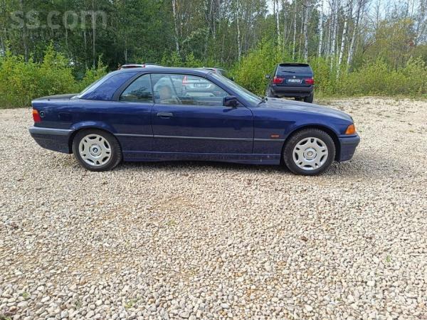 Blue BMW 320 1996 in Riga, with an engine capacity of 2.00 L and mileage of 199 thousand km for 4999 €, photo 3 on AUTOMOTO.COM.LV