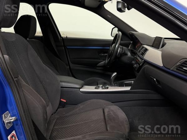 Blue BMW 320 2017 in Riga, with an engine capacity of 2.00 L and mileage of 238 thousand km for 15990 €, photo 8 on AUTOMOTO.COM.LV