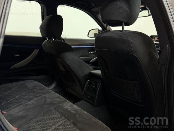 Blue BMW 320 2017 in Riga, with an engine capacity of 2.00 L and mileage of 238 thousand km for 15990 €, photo 9 on AUTOMOTO.COM.LV