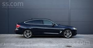Blue BMW 320 2018 in Riga, with an engine capacity of 2.00 L and mileage of 225 thousand km for 14650 €, photo 6 on AUTOMOTO.COM.LV