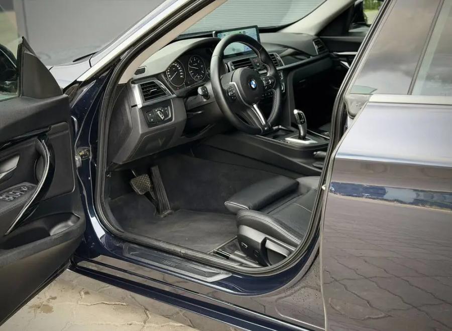 Blue BMW 320 2018 in Riga, with an engine capacity of 2.00 L and mileage of 227 thousand km for 14650 €, photo 10 on AUTOMOTO.COM.LV