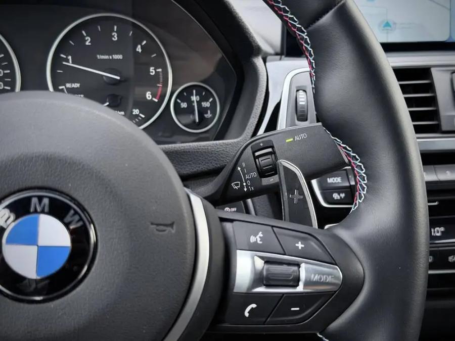 Blue BMW 320 2018 in Riga, with an engine capacity of 2.00 L and mileage of 227 thousand km for 14650 €, photo 14 on AUTOMOTO.COM.LV