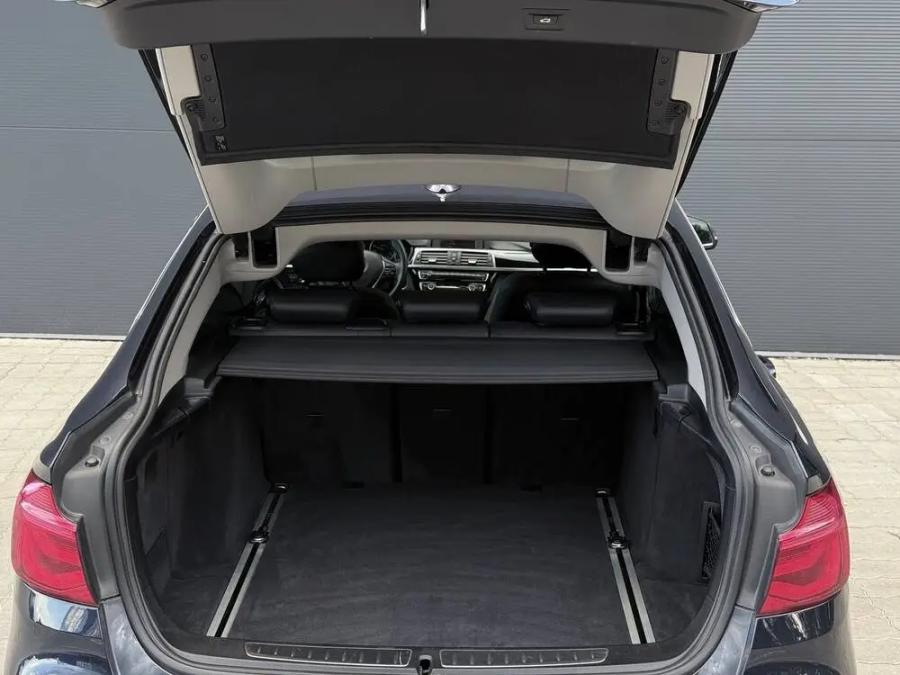 Blue BMW 320 2018 in Riga, with an engine capacity of 2.00 L and mileage of 227 thousand km for 14650 €, photo 26 on AUTOMOTO.COM.LV
