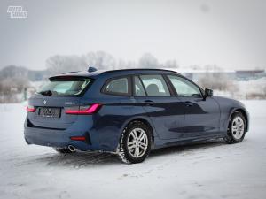 Blue BMW 320 2021 in Kaunas, with an engine capacity of 2.00 L and mileage of 190 thousand km for 19500 €, photo 3 on AUTOMOTO.COM.LV