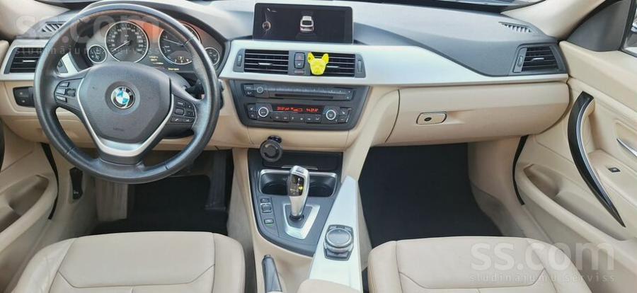 Brown BMW 320 2013 in Riga, with an engine capacity of 2.00 L and mileage of 295 thousand km for 8950 €, photo 11 on AUTOMOTO.COM.LV