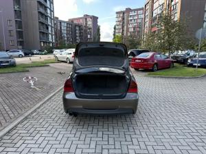 Brown BMW 320 2007 in Riga, with an engine capacity of 2.00 L and mileage of 210 thousand km for 4390 €, photo 7 on AUTOMOTO.COM.LV