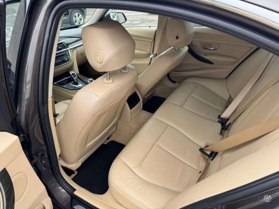 Brown BMW 320 2012 in Jurbarkas, with an engine capacity of 2.00 L and mileage of 235 thousand km for 8250 €, photo 9 on AUTOMOTO.COM.LV