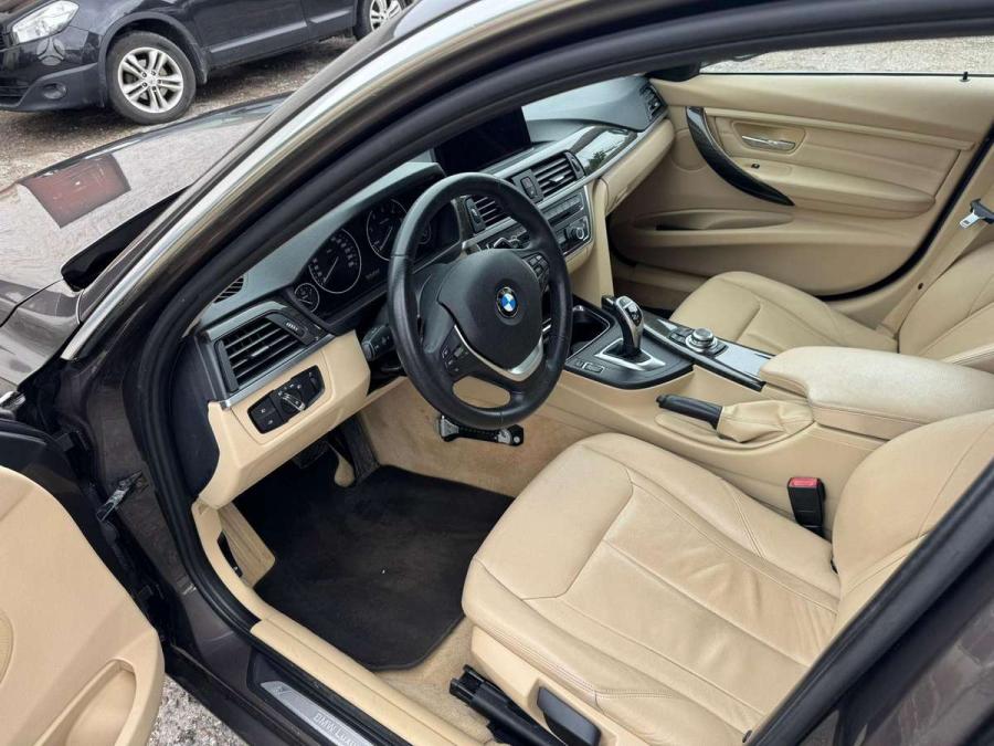 Brown BMW 320 2012 in Jurbarkas, with an engine capacity of 2.00 L and mileage of 235 thousand km for 8250 €, photo 10 on AUTOMOTO.COM.LV