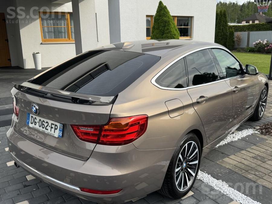 Brown BMW 320 2014 in Riga, with an engine capacity of 2.00 L and mileage of 240 thousand km for 10800 €, photo 5 on AUTOMOTO.COM.LV