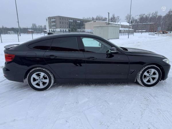 Black BMW 320 Gran Turismo 2013 in Vilnius, with an engine capacity of 2.00 L and mileage of 304 thousand km for 7950 €, photo 7 on AUTOMOTO.COM.LV