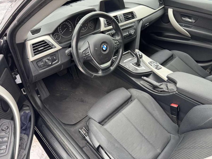 Black BMW 320 Gran Turismo 2013 in Vilnius, with an engine capacity of 2.00 L and mileage of 304 thousand km for 7950 €, photo 9 on AUTOMOTO.COM.LV