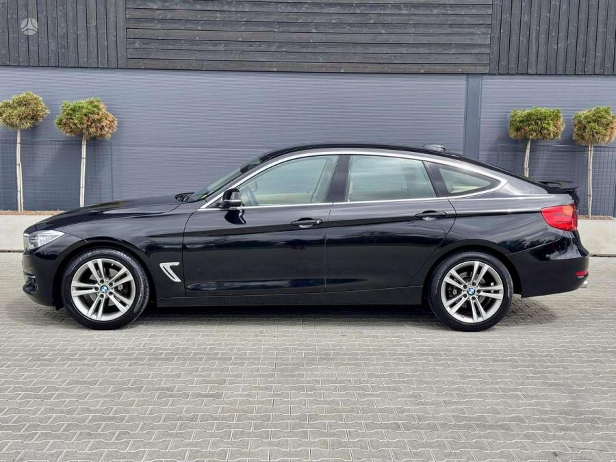 Black BMW 320 Gran Turismo 2013 in Siauliai, with an engine capacity of 2.00 L and mileage of 290 thousand km for 7950 €, photo 12 on AUTOMOTO.COM.LV