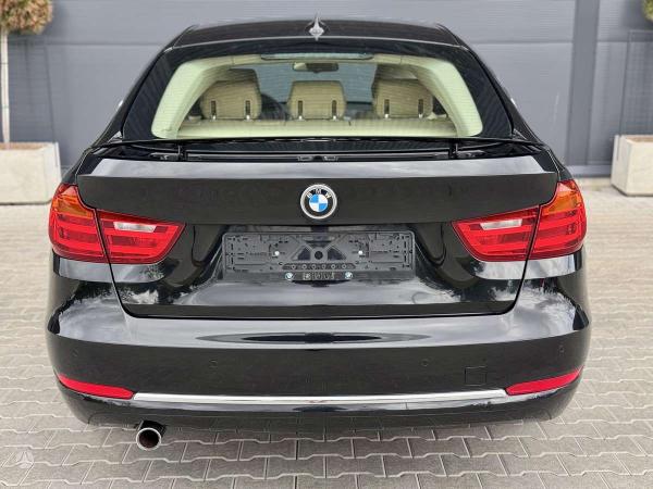 Black BMW 320 Gran Turismo 2013 in Siauliai, with an engine capacity of 2.00 L and mileage of 290 thousand km for 7950 €, photo 8 on AUTOMOTO.COM.LV