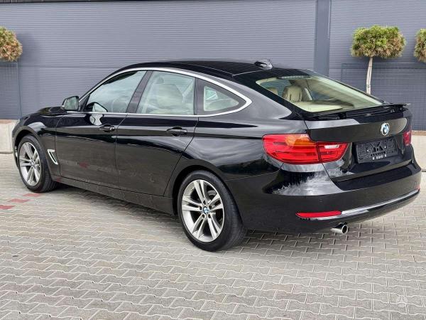 Black BMW 320 Gran Turismo 2013 in Siauliai, with an engine capacity of 2.00 L and mileage of 290 thousand km for 7950 €, photo 7 on AUTOMOTO.COM.LV