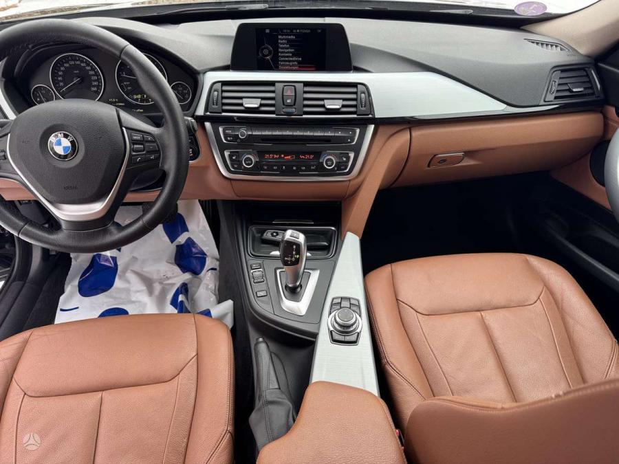 Melns BMW 320 Gran Turismo 2015 Šauļi, ar dzinēja tilpumu 2.00 L un nobraukumu 233 tūkst. km par 9950 €, foto 20 vietnē AUTOMOTO.COM.LV