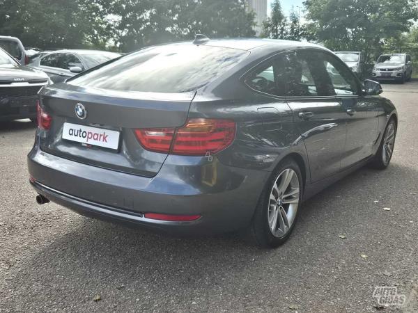 Black BMW 320 Gran Turismo 2015 in Vilnius, with an engine capacity of 2.00 L and mileage of 217 thousand km for 10999 €, photo 4 on AUTOMOTO.COM.LV